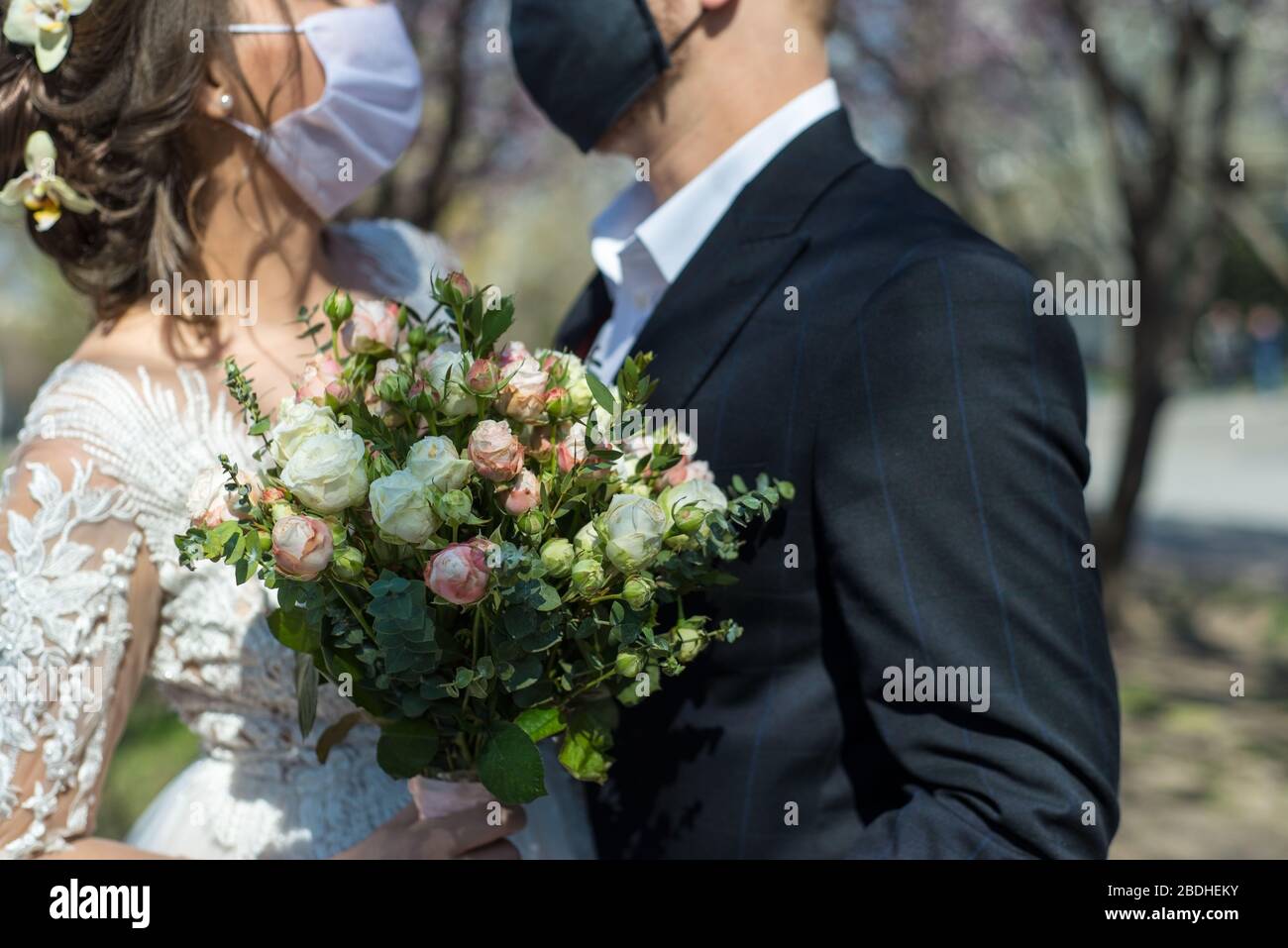 coronavirus infection 2020. Kovid 19. Portrait of a masked bride and ...