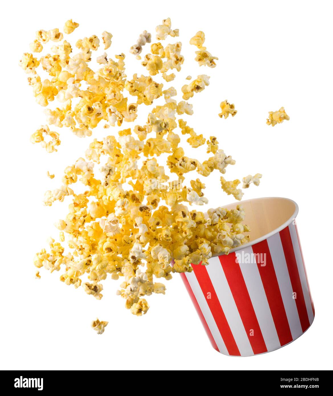 Flying popcorn from paper striped bucket isolated on black background ...