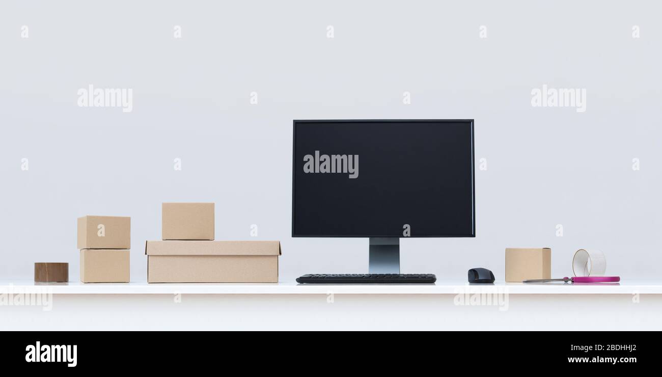 Clean white office desk in with computer boxes and scissors Stock Photo ...