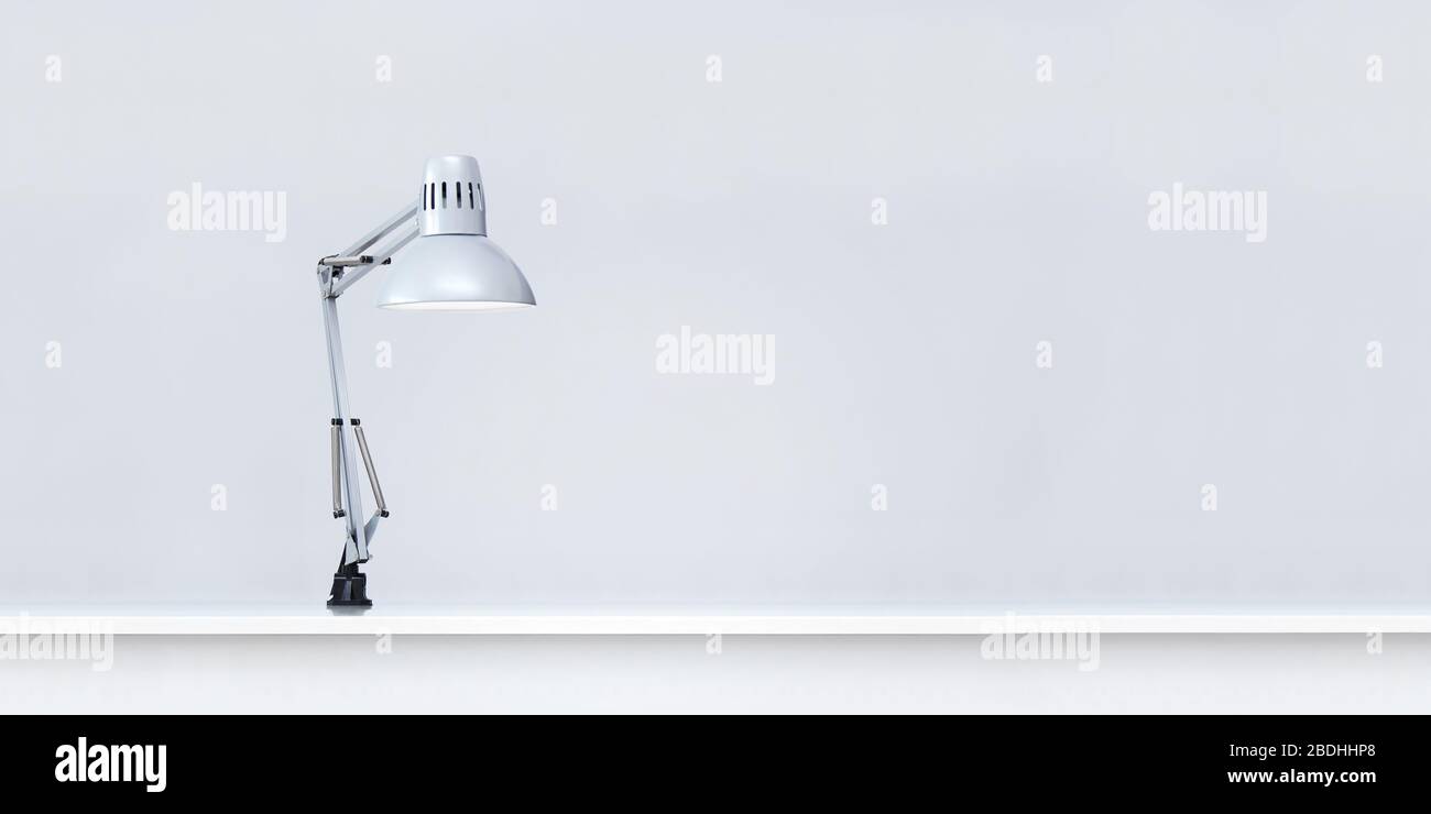 Clean white desk with desk lamp and free space Stock Photo - Alamy