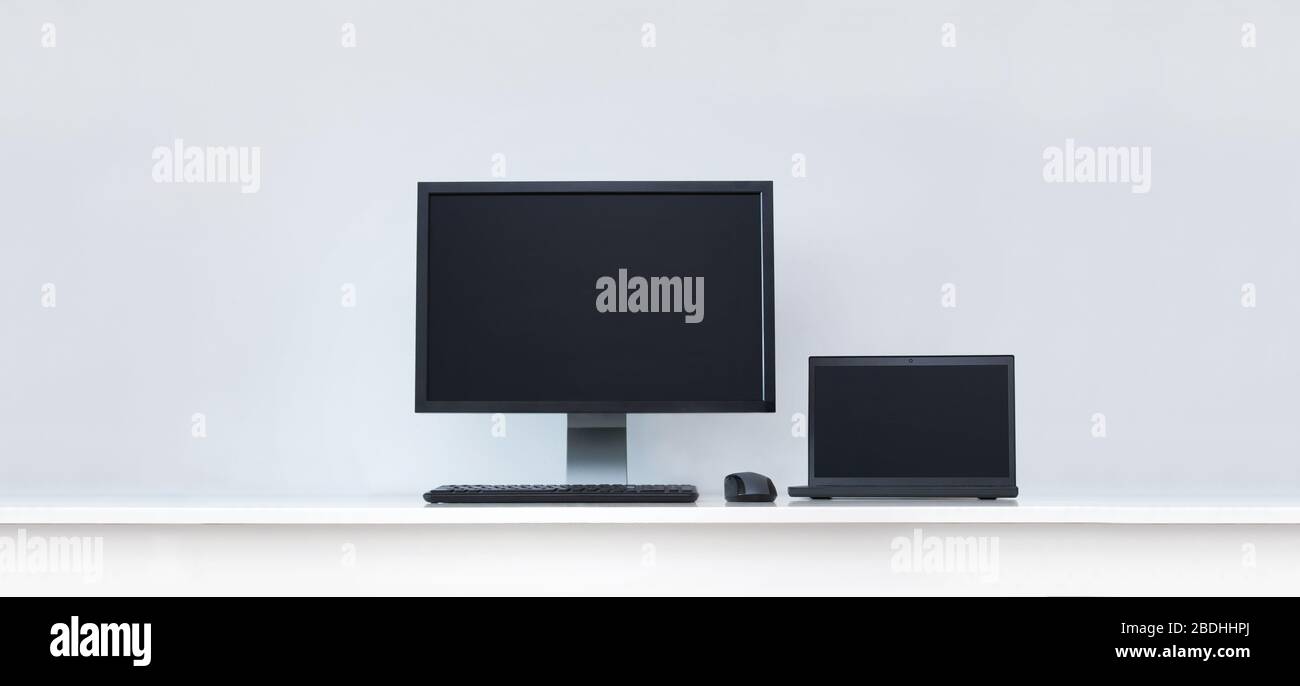 Clean white desk with computer and copy space Stock Photo - Alamy
