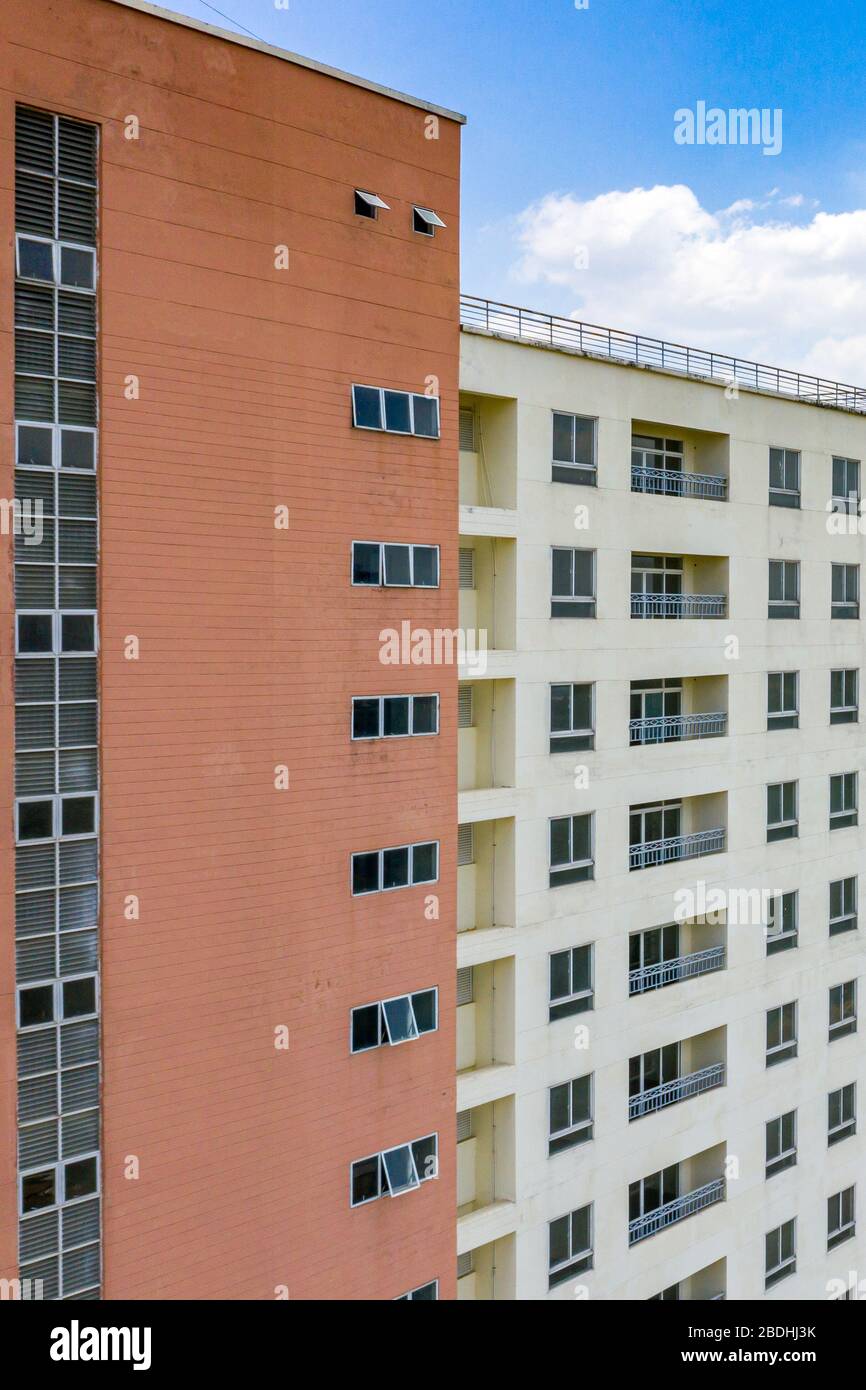 Vertical photo of apartment building with window and balcony Stock ...