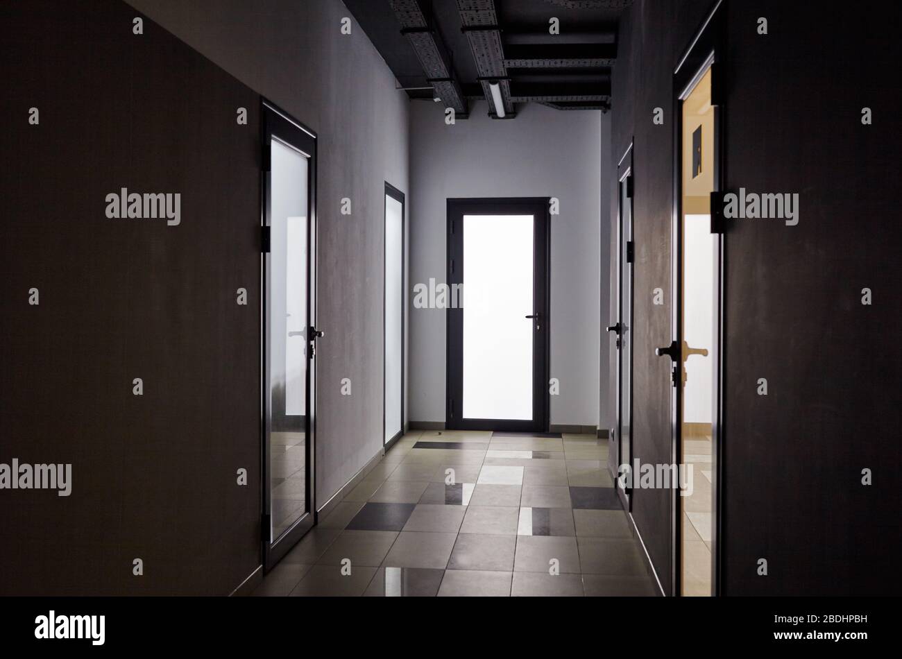 Corridor in modern office building, muffled light, close-up hallway in ...