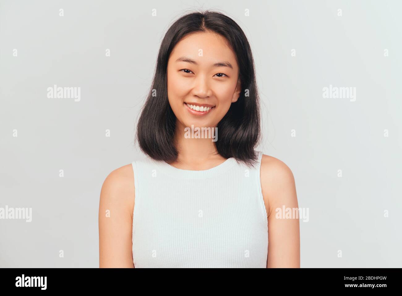 Woman tilts head hi-res stock photography and images - Alamy