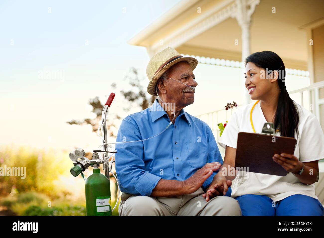 Nurse helping elderly man with oxygen hi-res stock photography and ...