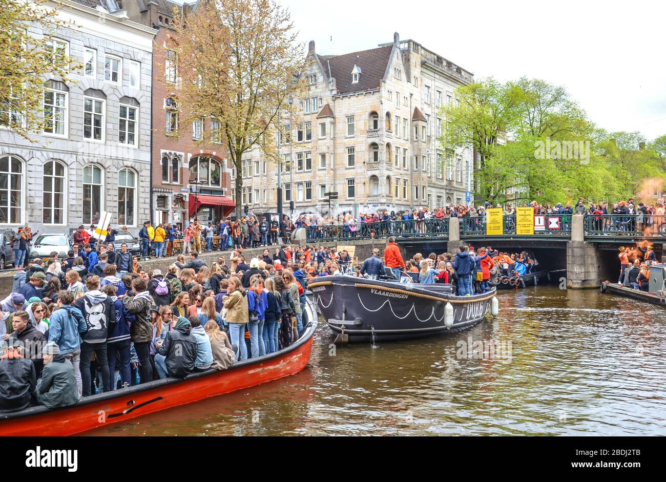 Amsterdam, Netherlands - April 27, 2019: People on party boats ...