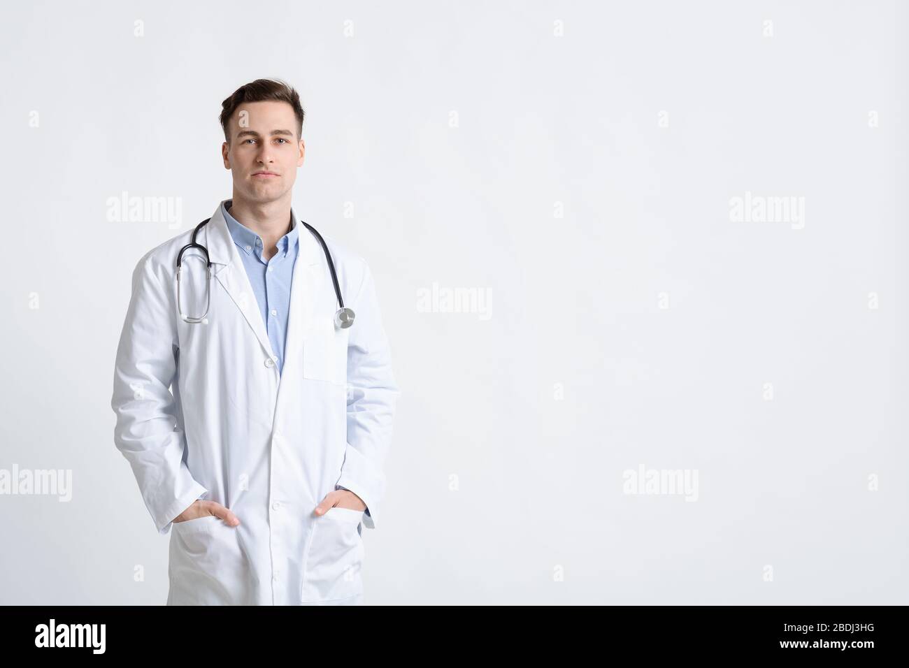 Health check concept. Handsome doctor with stethoscope Stock Photo - Alamy