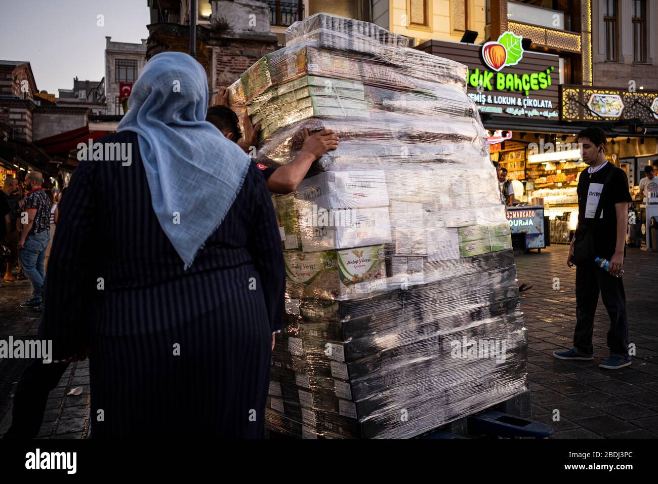 Istanbul, Turkey - 27 August 2019 : Carrying a pack of food boxes in ...