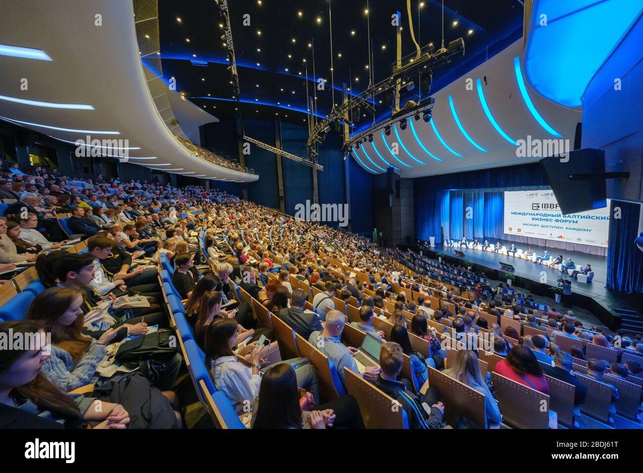 Business conference attendees sit and listen Stock Photo - Alamy