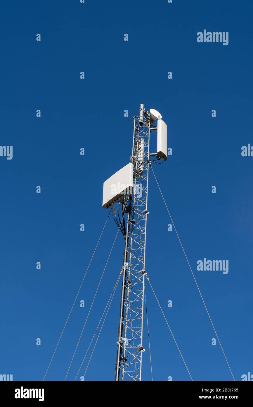A modern wireless telecommunication tower antenna transmitter or base ...