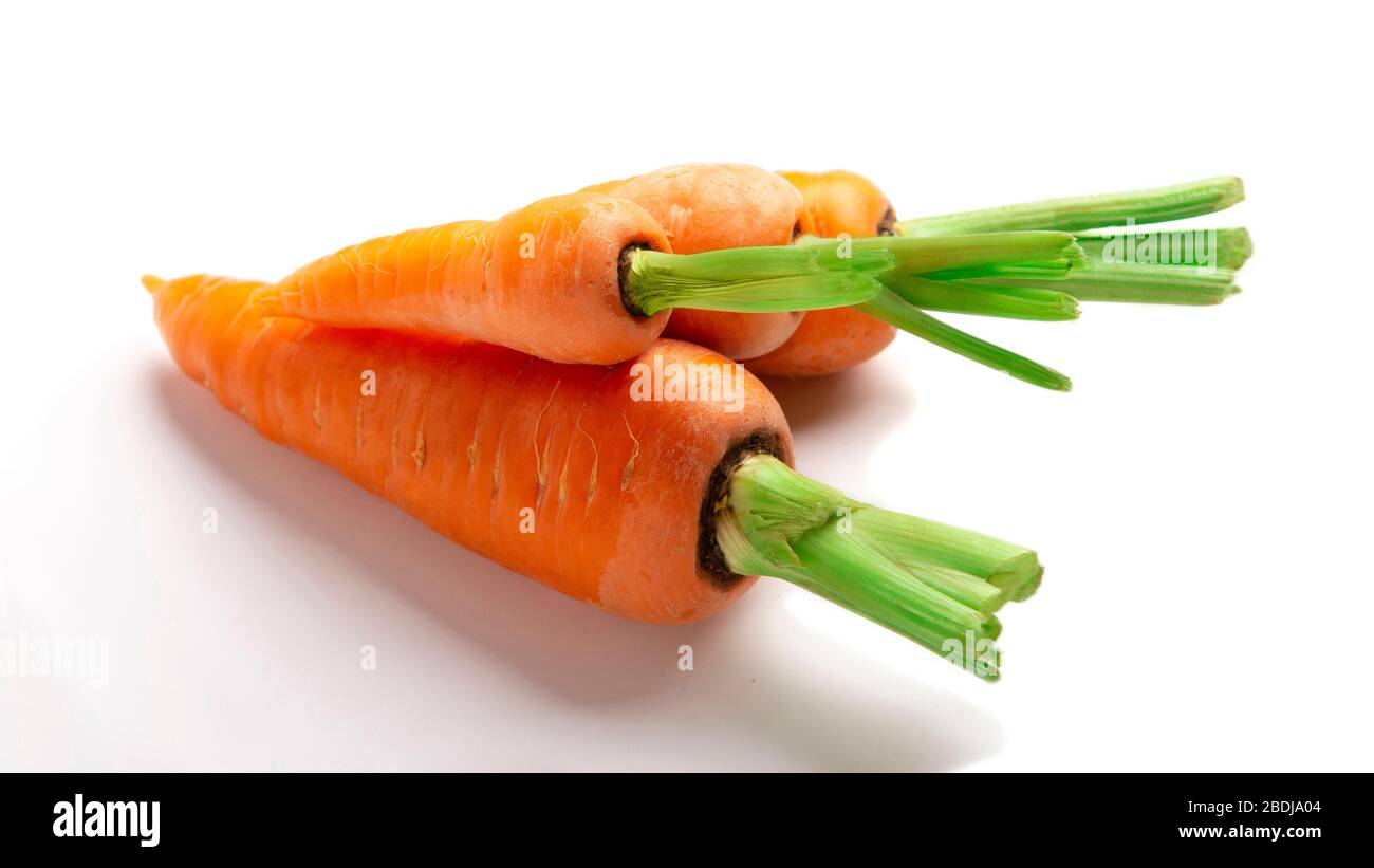 Carrots roots close up hi-res stock photography and images - Alamy