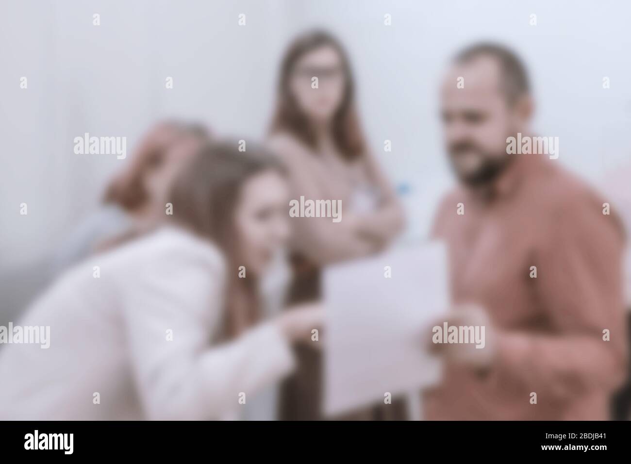 blurred business people having conversation at meeting Stock Photo - Alamy
