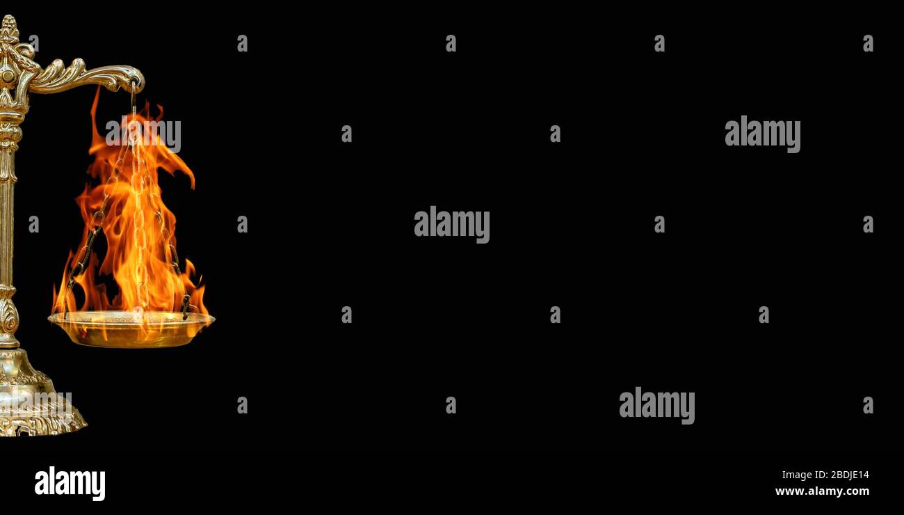 scales with a flame on the tas on a white background Stock Photo - Alamy