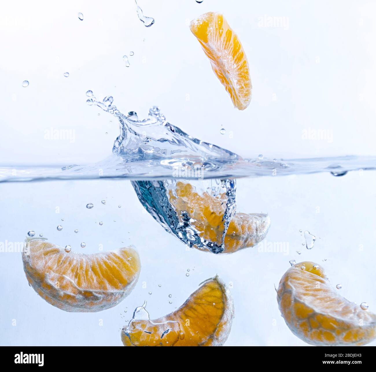 Fruit Splashing into Water Stock Photo - Alamy