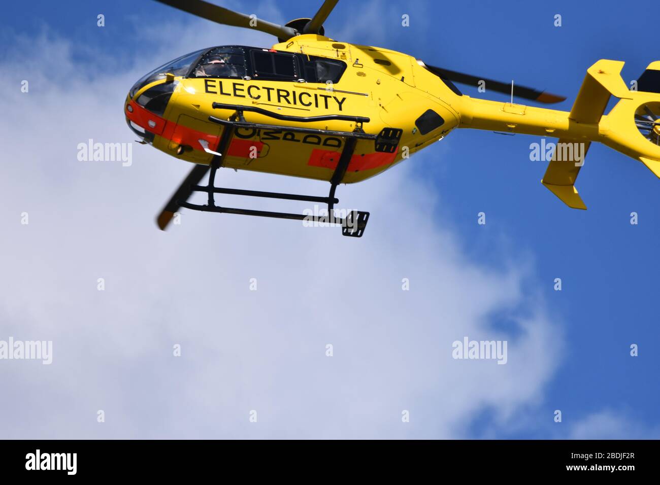 The WPD yellow EC 135 electricity helicopter in the skies over Bristol ...