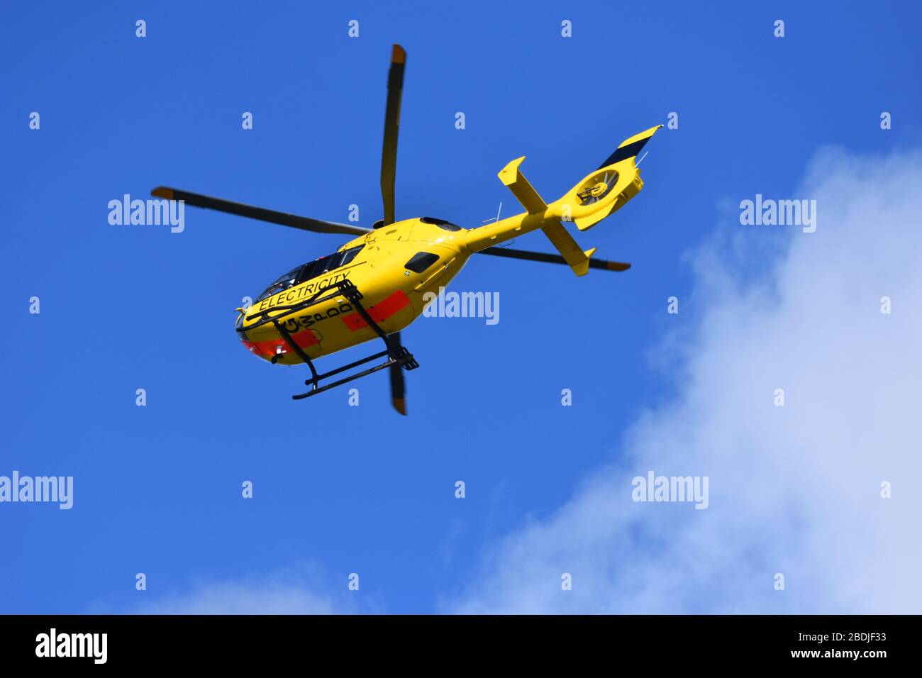 The WPD yellow EC 135 electricity helicopter in the skies over Bristol ...
