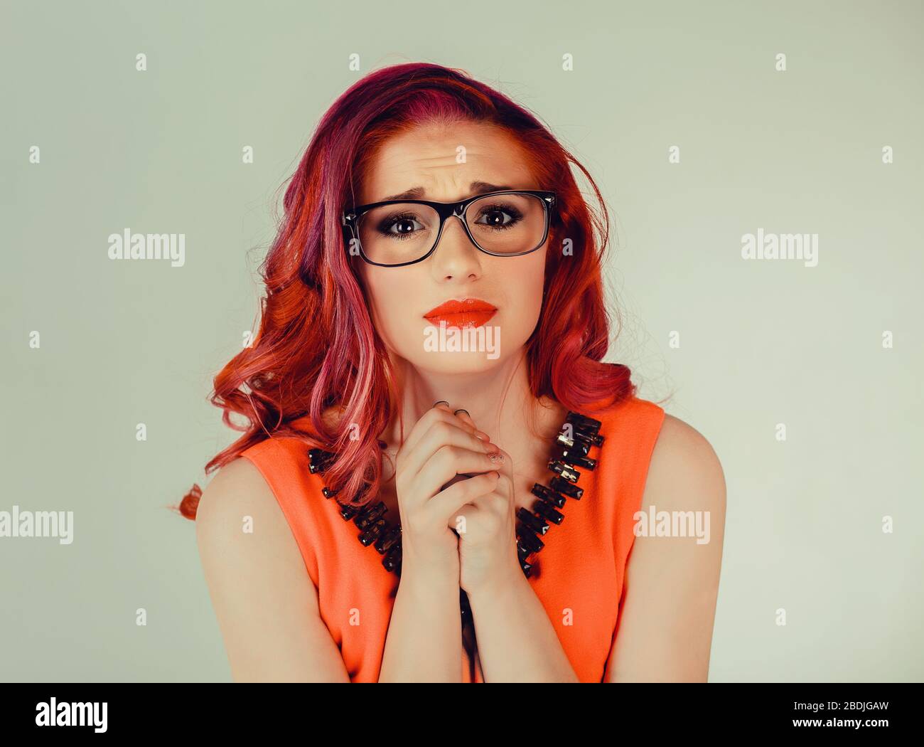 Begging. Closeup portrait sad young woman praying, hoping for the best ...