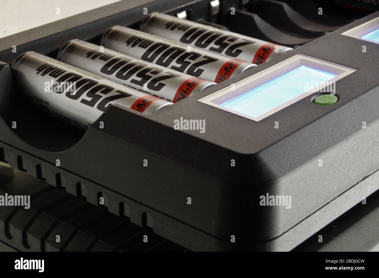 Charging batteries in the charging bay Stock Photo - Alamy