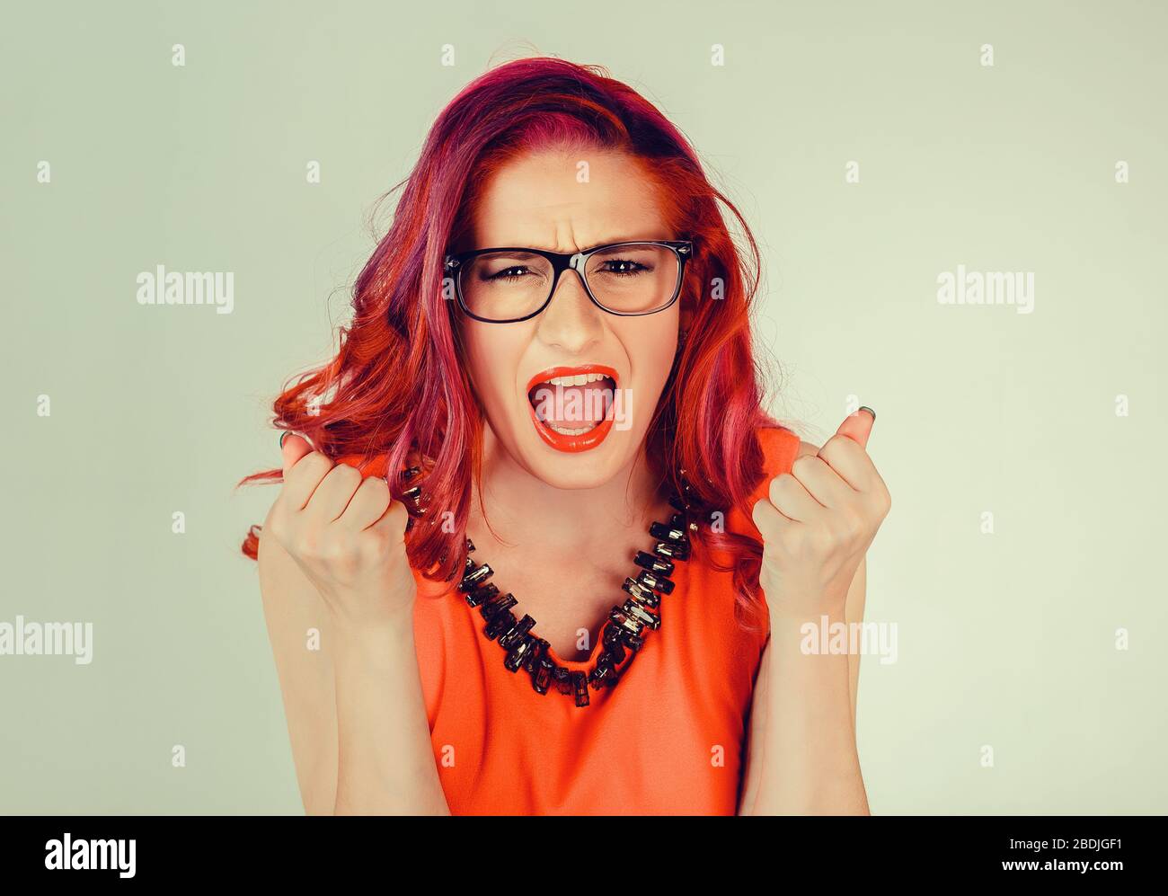 Angry. Closeup portrait unhappy young woman hysterical having nervous ...