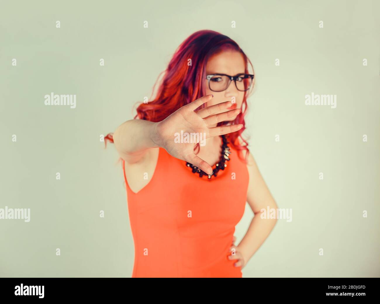 Closeup portrait young angry serious woman showing her denial No Stop ...