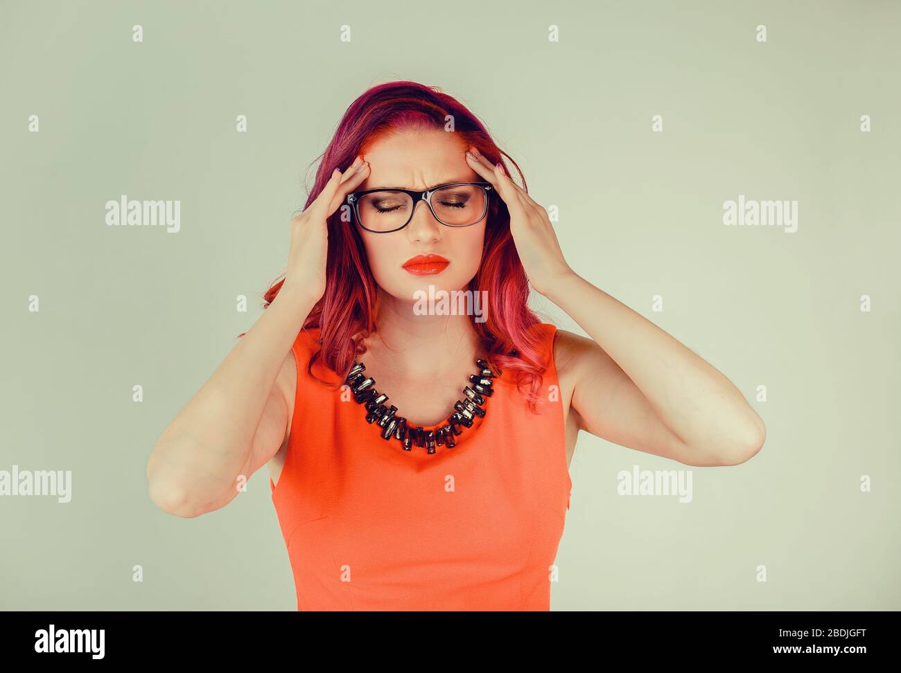 Headache migraine person, woman stressed. Closeup portrait young female ...