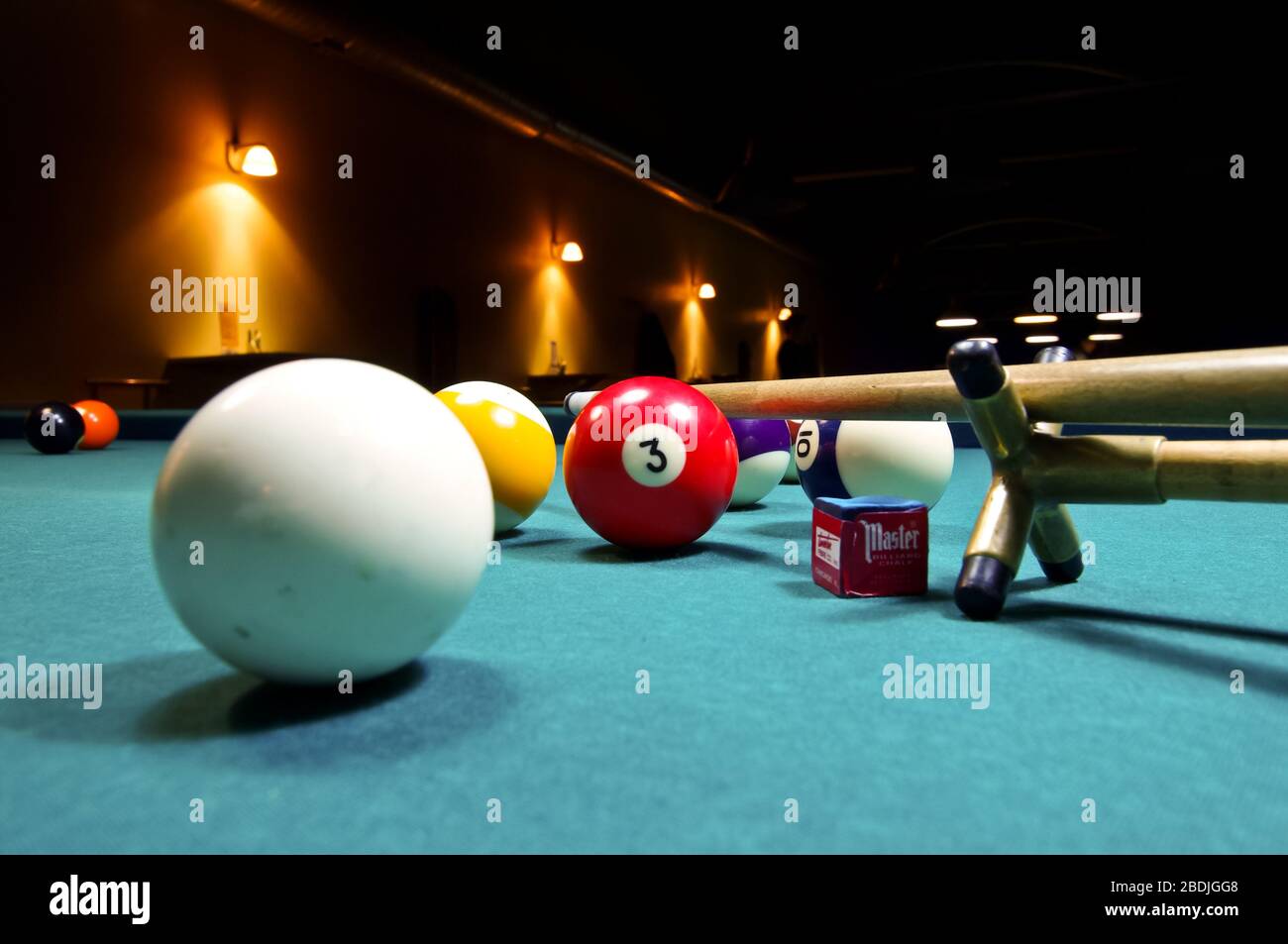 Pool balls and equipment on the pool table Stock Photo - Alamy