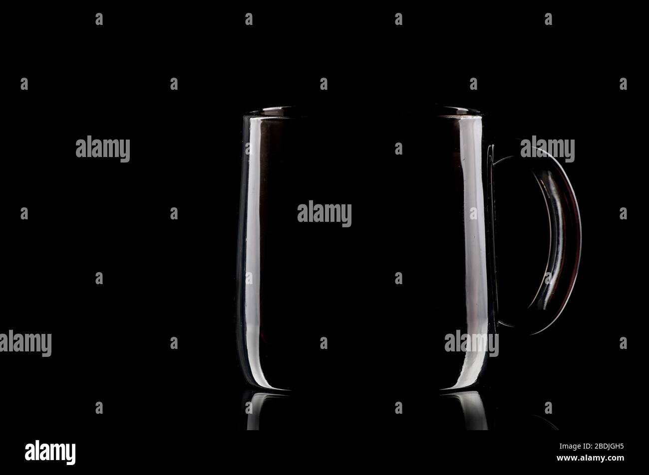 Dark glass coffee mug Stock Photo - Alamy