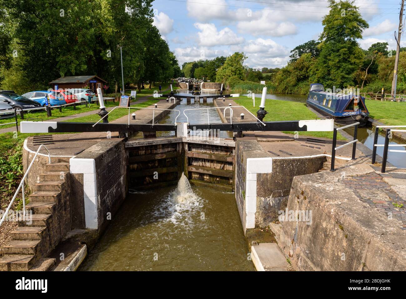 Narrowboats at Hatton Locks on the grand union canal, Warwickshire ...