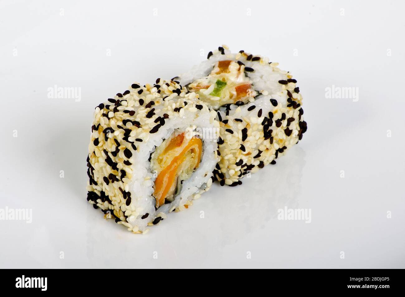 Salmon maki rolls with sesame seeds. Japanese cuisine food Stock Photo ...