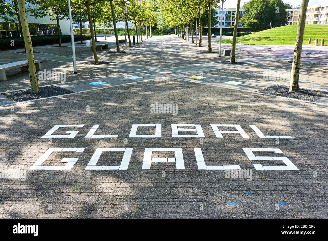 Street with text global goals. World leaders goals for a better world ...