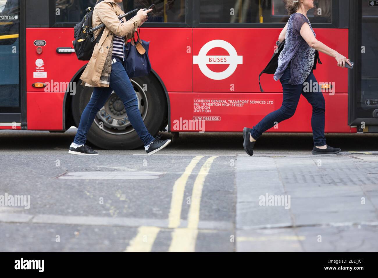 Strand red buses hi-res stock photography and images - Alamy