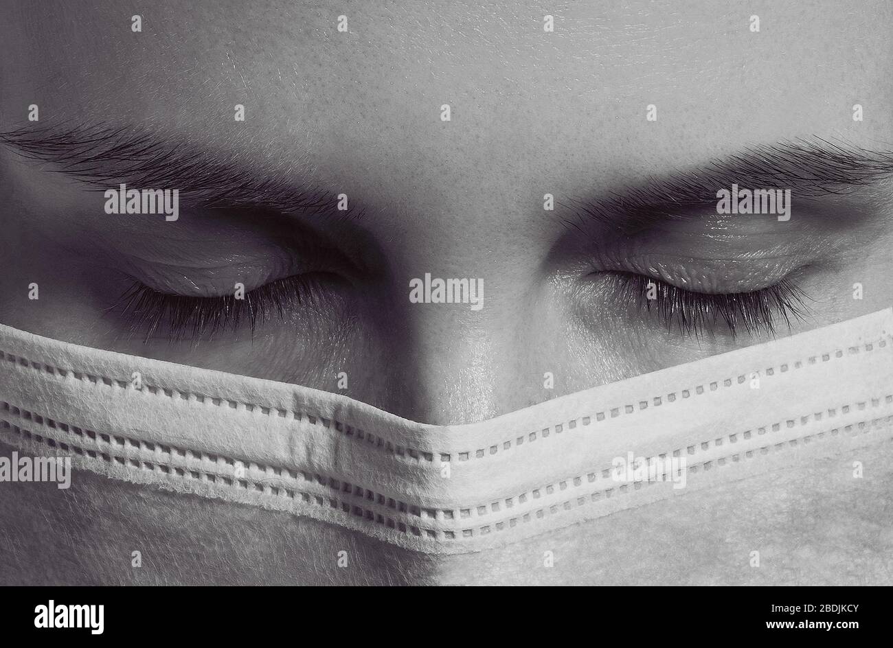 Close up on girl's closed eyes wearing protection mask Stock Photo - Alamy