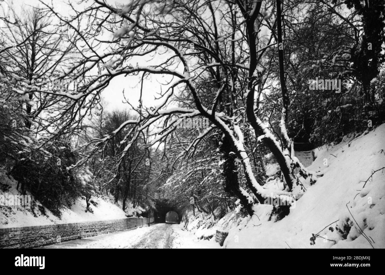 Reigate, Tunnel Road in the Snow 1890 Stock Photo - Alamy