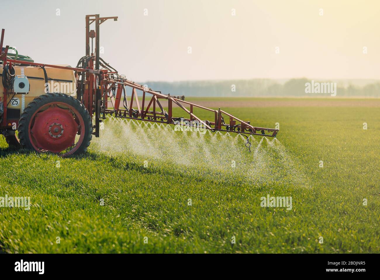 Tractor Spraying Herbicides on Field Agriculture Stock Photo - Alamy
