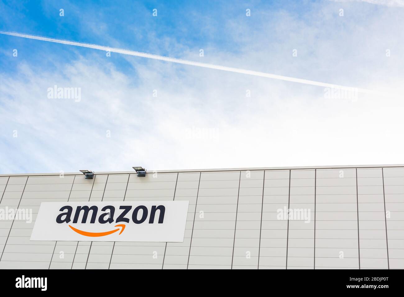 Amazon logo on the company warehouse building located in Lyon, France ...