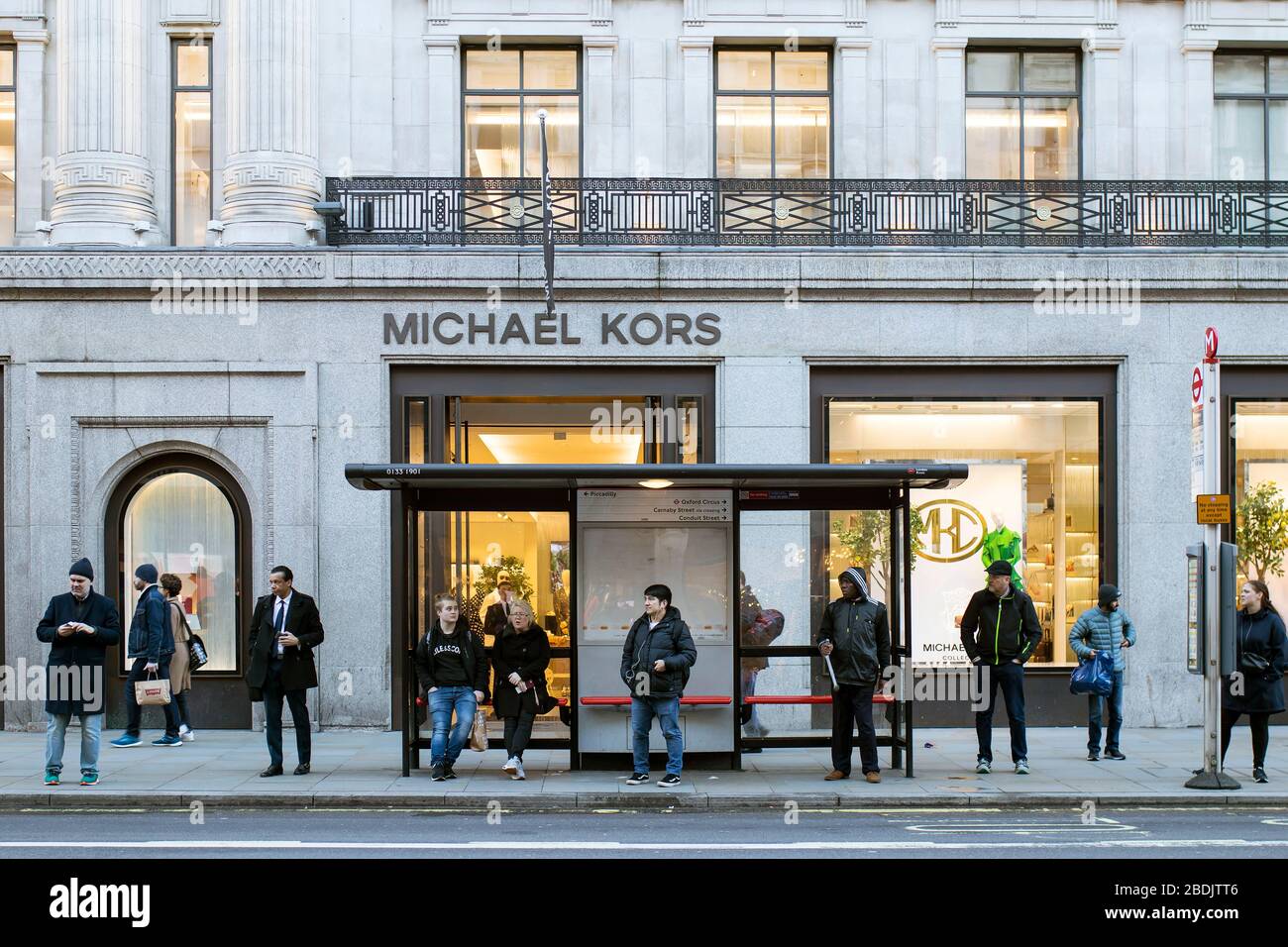 London, UK - 15 January 2020 Queue at the bus stop. People are waiting ...