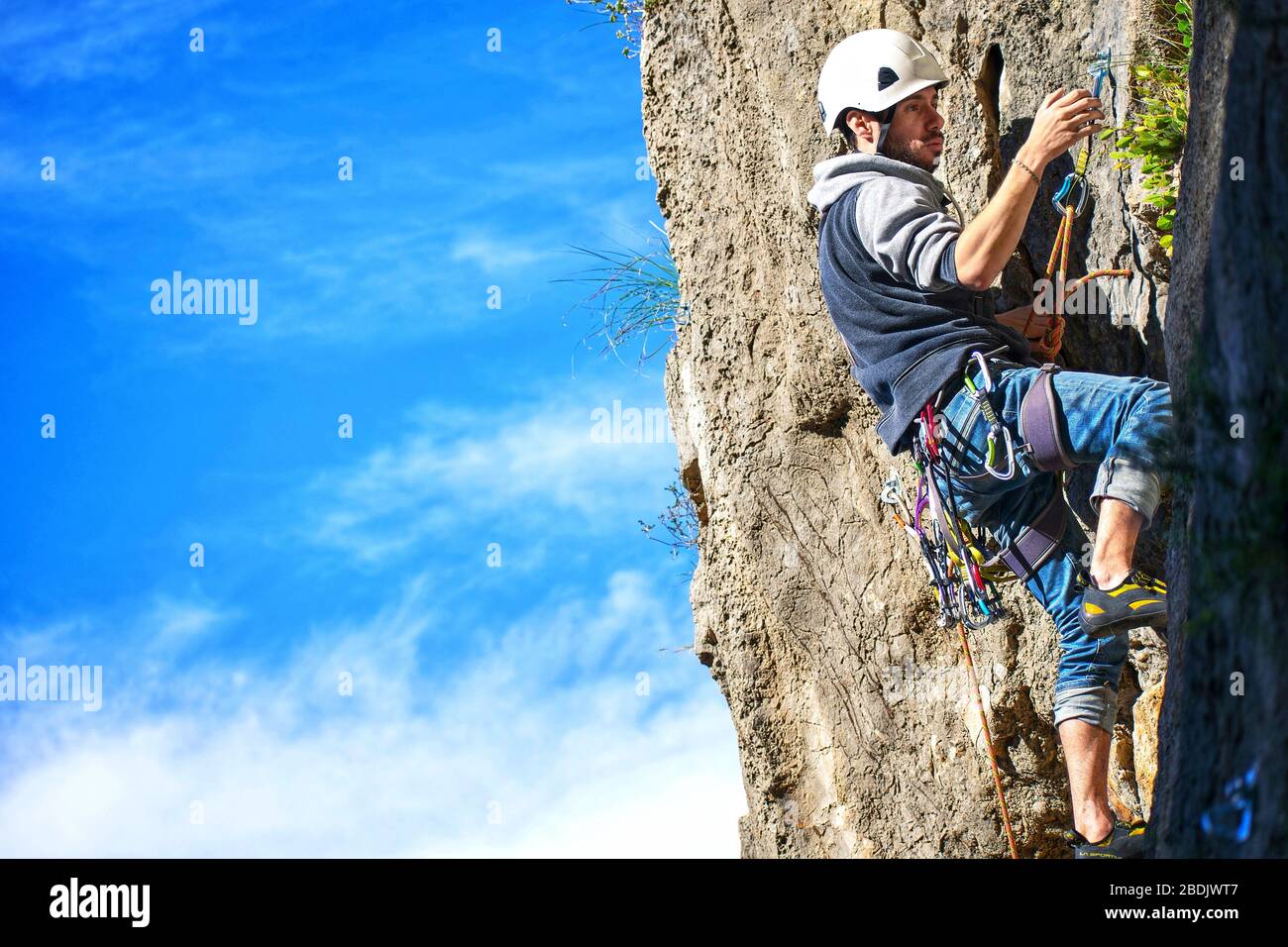 One sportsman mountain climbing. Physical activity in the countryside ...