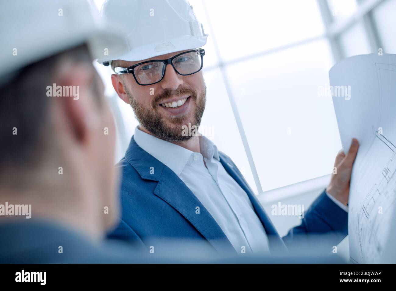 Smiling civil engineer showing hi-res stock photography and images - Alamy