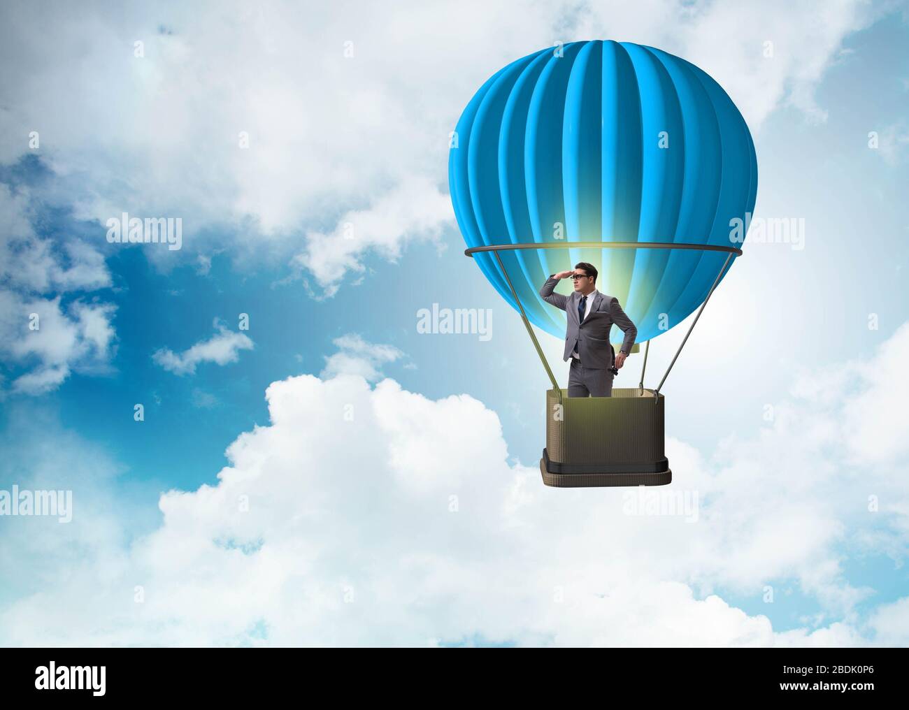 The businessman flying on balloon in challenge concept Stock Photo - Alamy