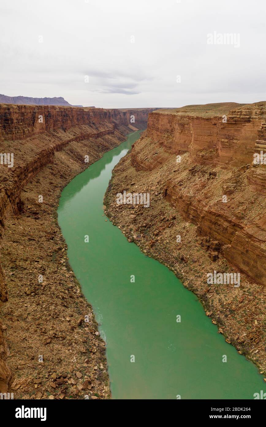 Aerial of The Colorado River Cutting a Green Line through the De Stock ...