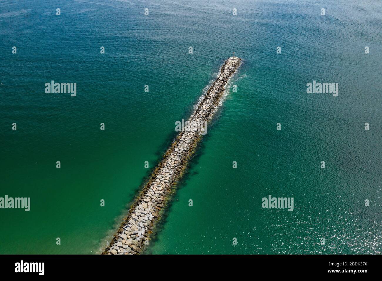 A Break Wall Extends Far out into the Ocean in Southern Californ Stock ...