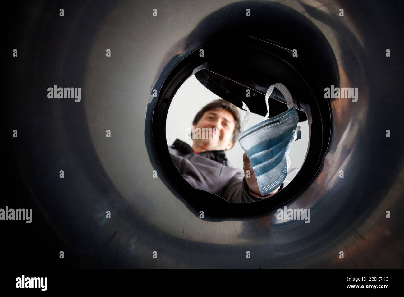 Man throwing mask away hi-res stock photography and images - Alamy