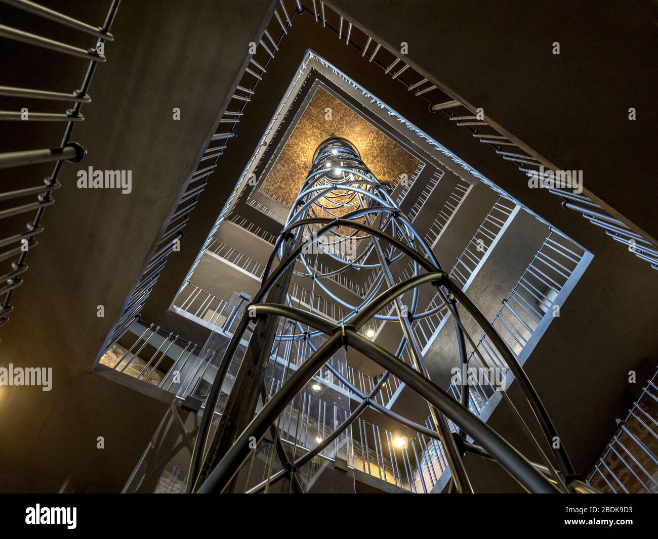 The futuristic lift elevator and staircase inside the clock tower of ...