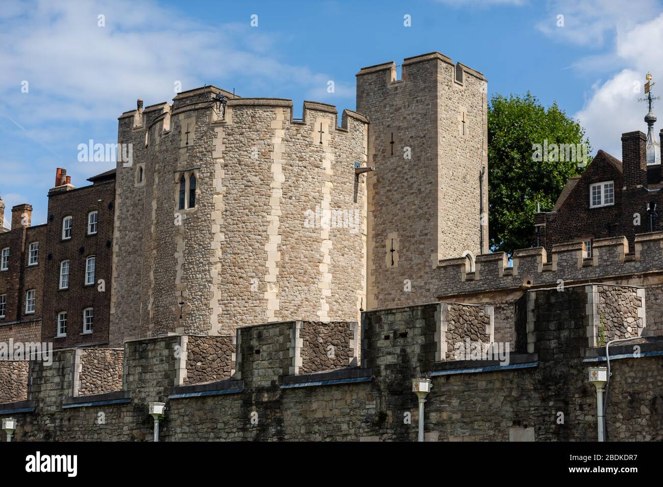 The exterior walls, towers and buildings of the Tower of London, that ...