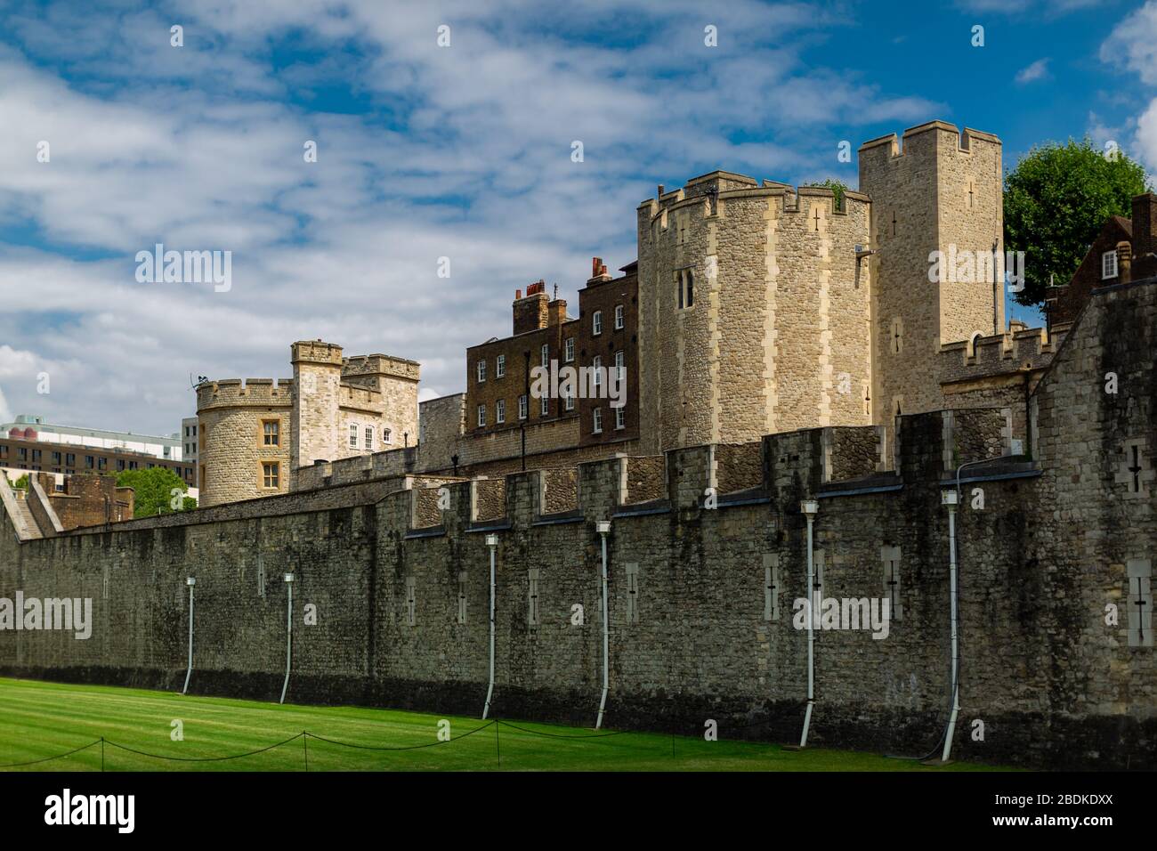 The exterior walls, towers and buildings of the Tower of London, that ...
