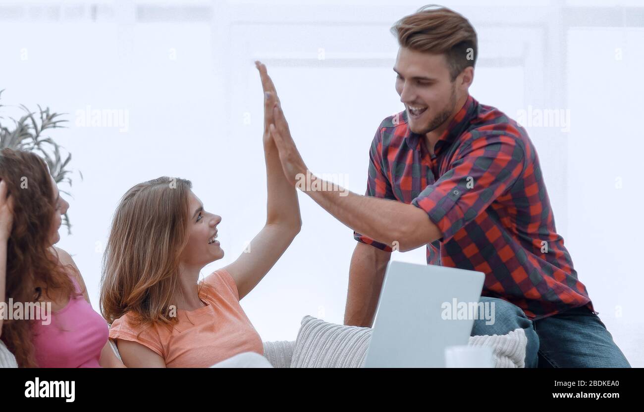 happy friends give each other five Stock Photo - Alamy