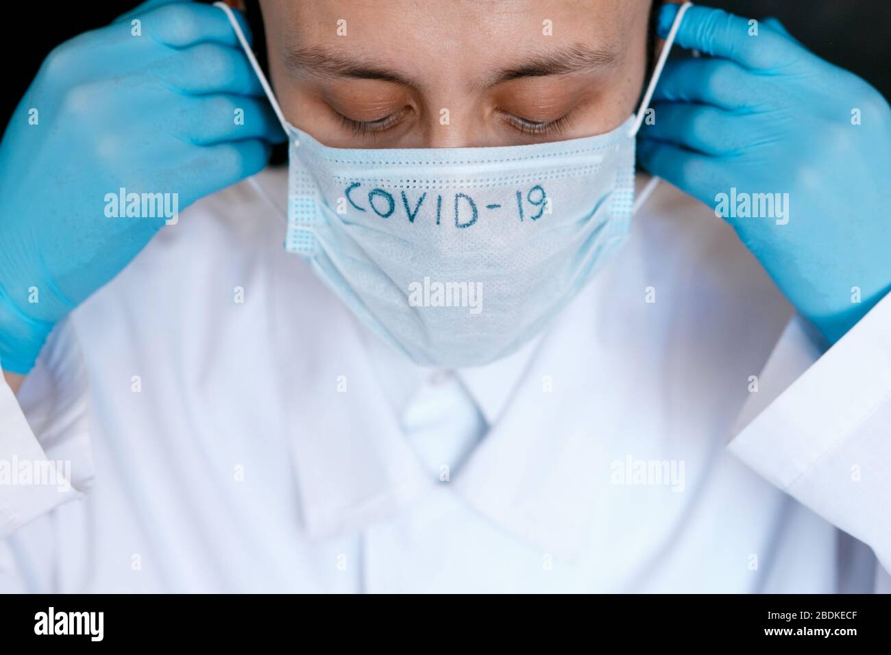 Coronavirus surgical mask doctor wearing face protective mask against ...