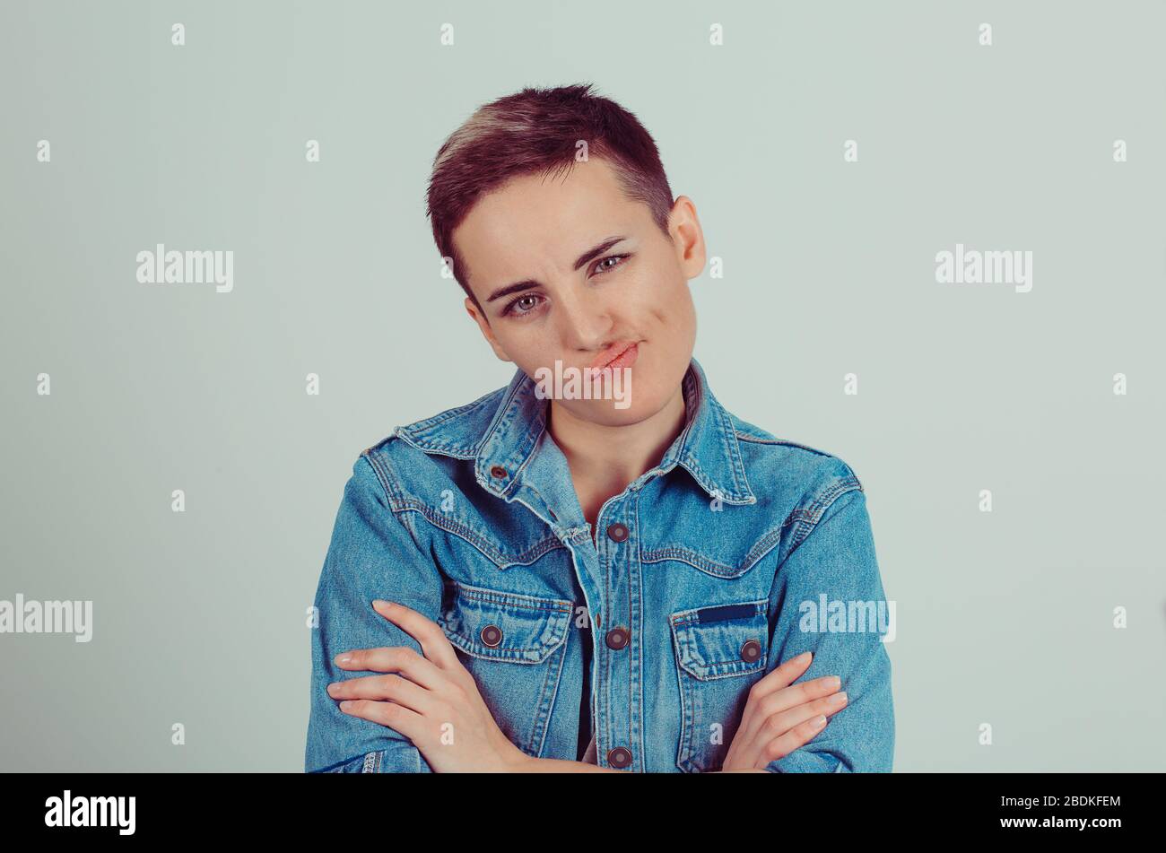 Skeptical. Closeup portrait of young lady, woman looking suspicious ...