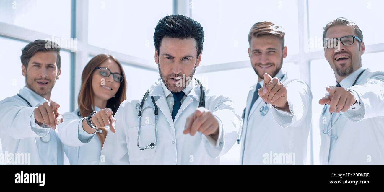 group of confident doctors pointing their finger at you Stock Photo - Alamy