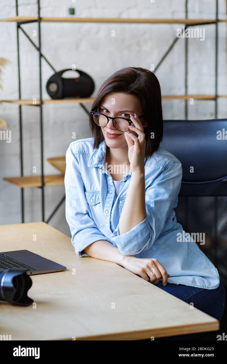 Working from home. Communication online. Portrait of smiling female ...